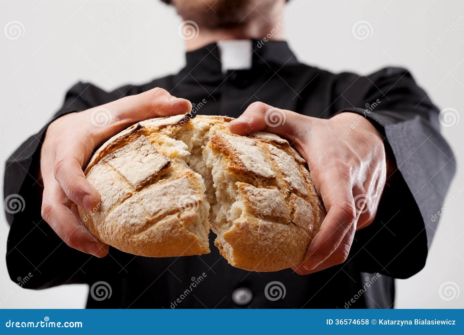 Priest Holding Loaf Of Bread Stock Photo - Image: 36574658