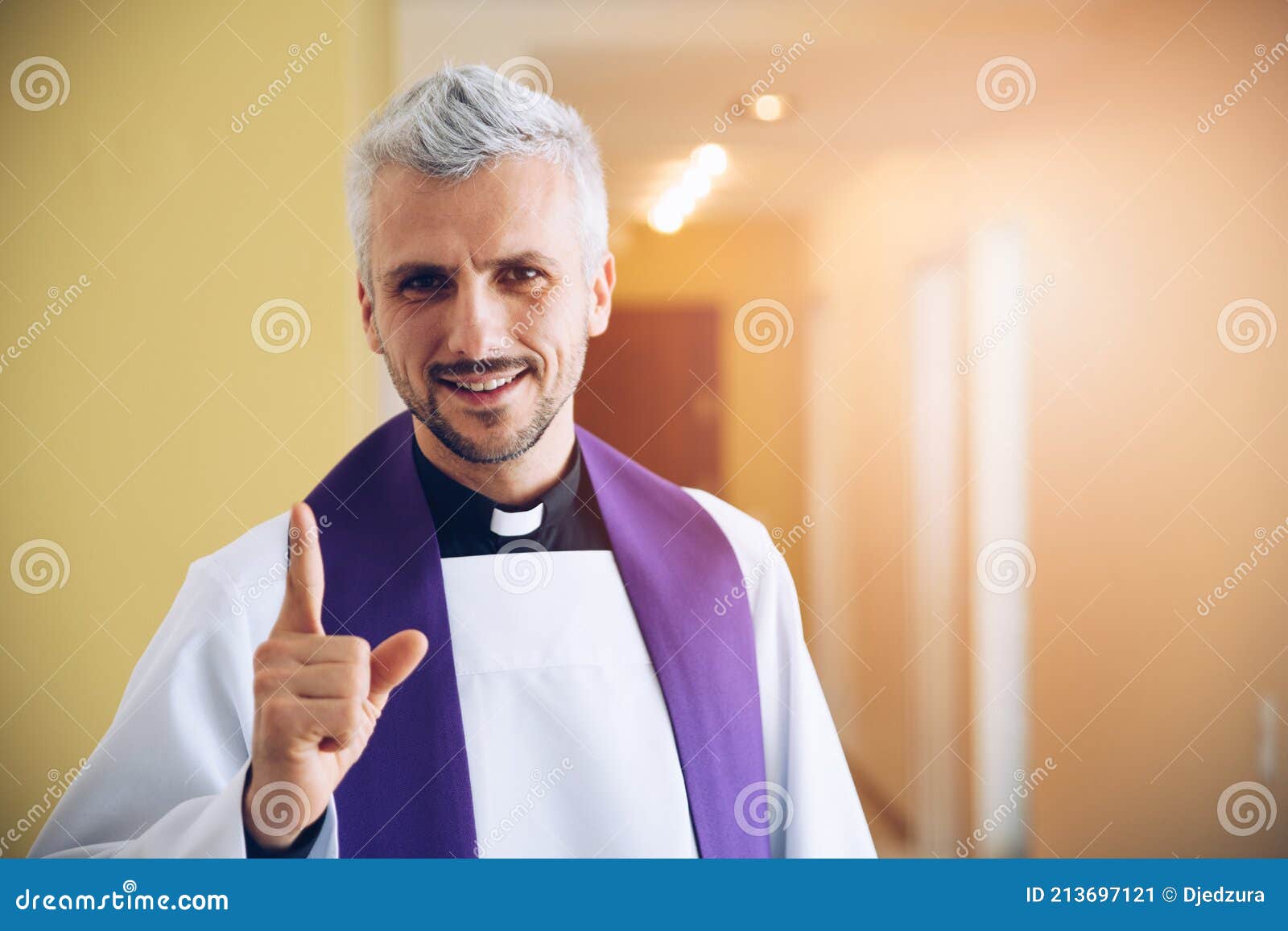 Priest Man Standing with a Smile on Face, Pointing with Hand Finger ...
