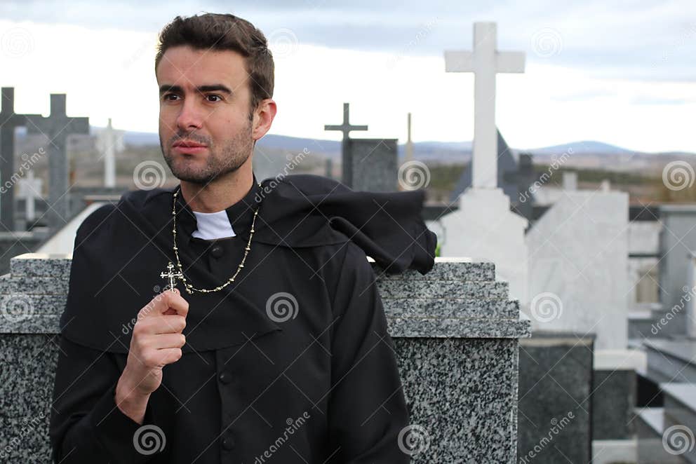 Priest Performing an Exorcism in a Windy Cemetery Stock Image - Image ...