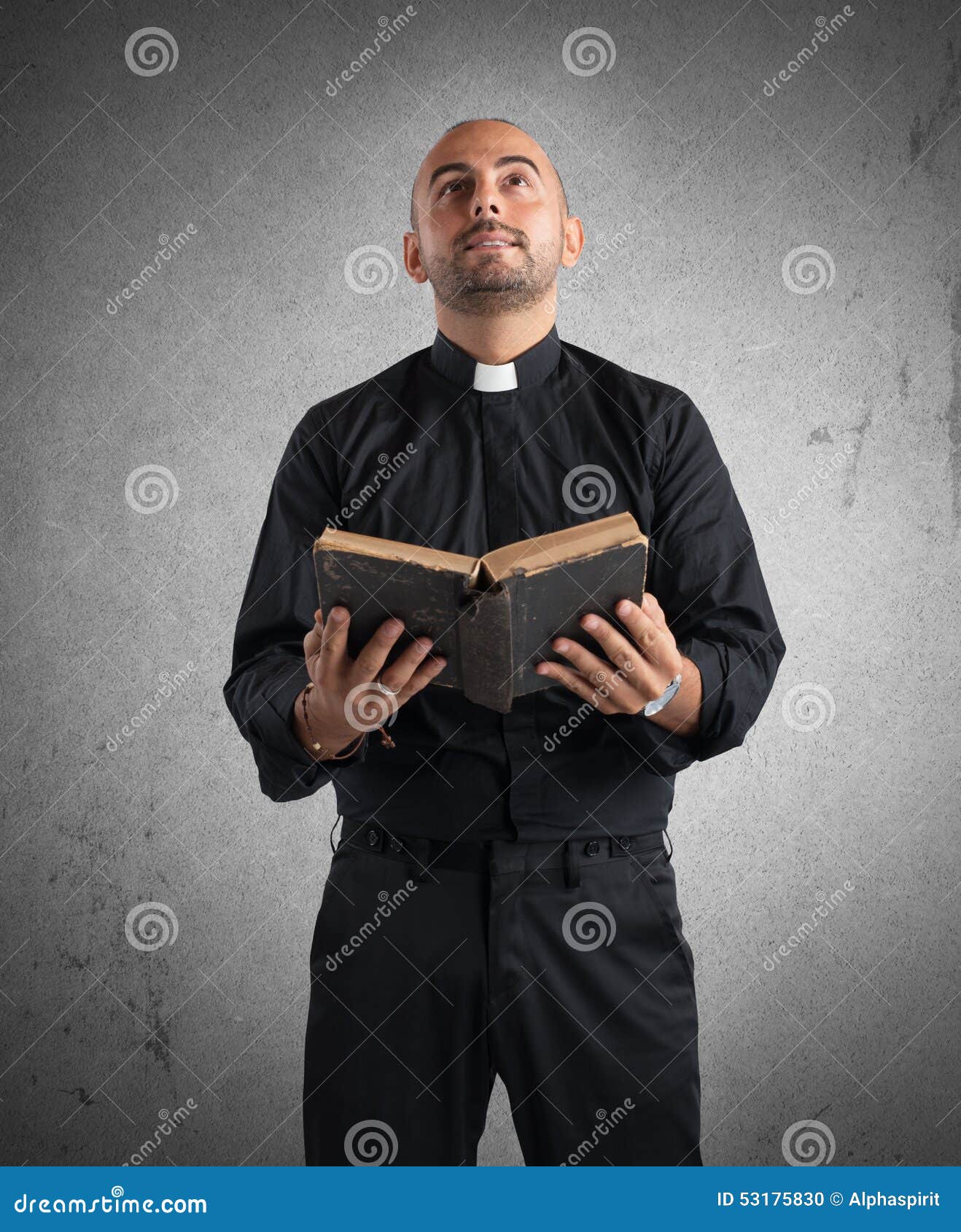 Priest Praying To God. Portrait Of Priest Praying While Standing ...