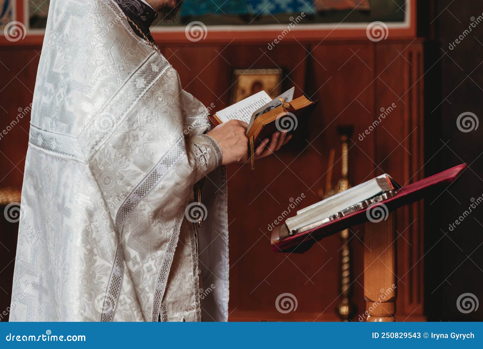 Priest reading from bible stock image. Image of religion - 250829543