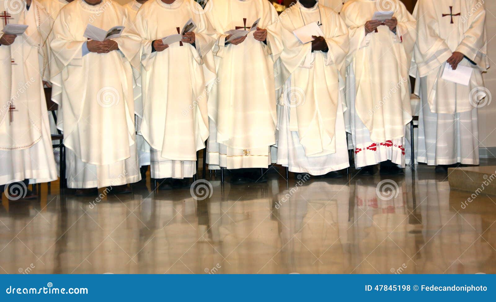 Priest with White White Dress during the Holy Mass Stock Photo - Image ...