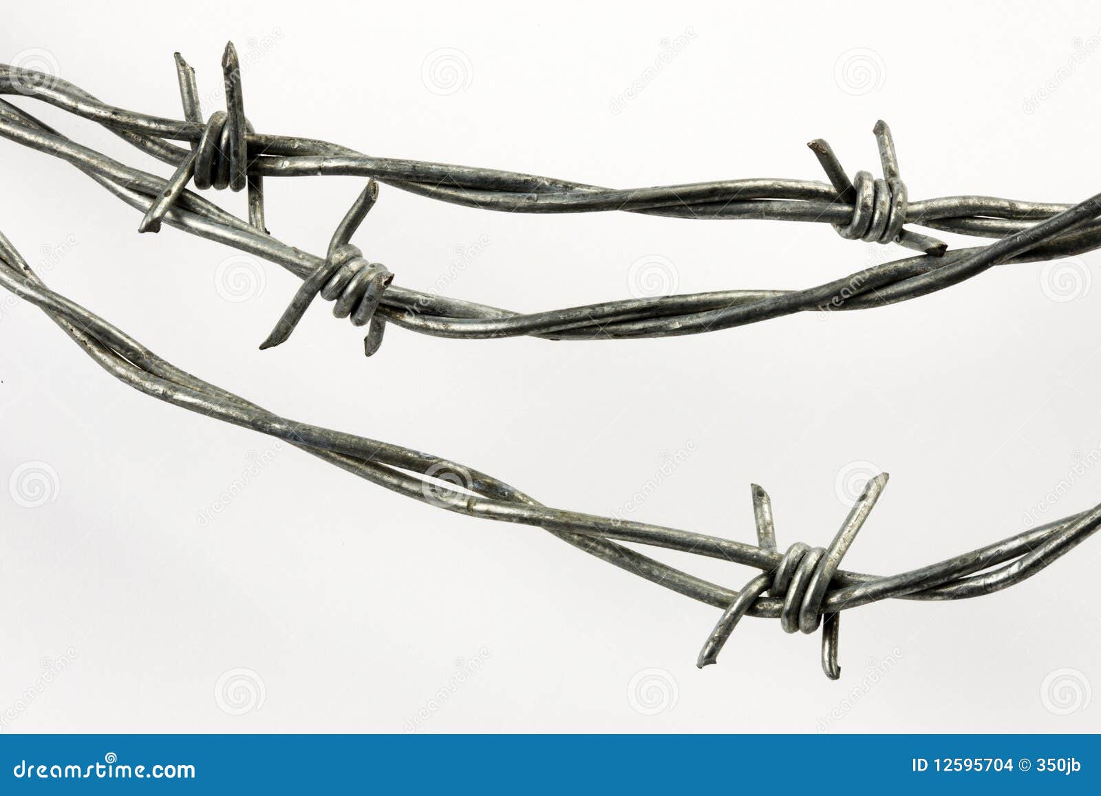 Prikkeldraad stock foto. Image of metaal, barricade, scherp - 12595704