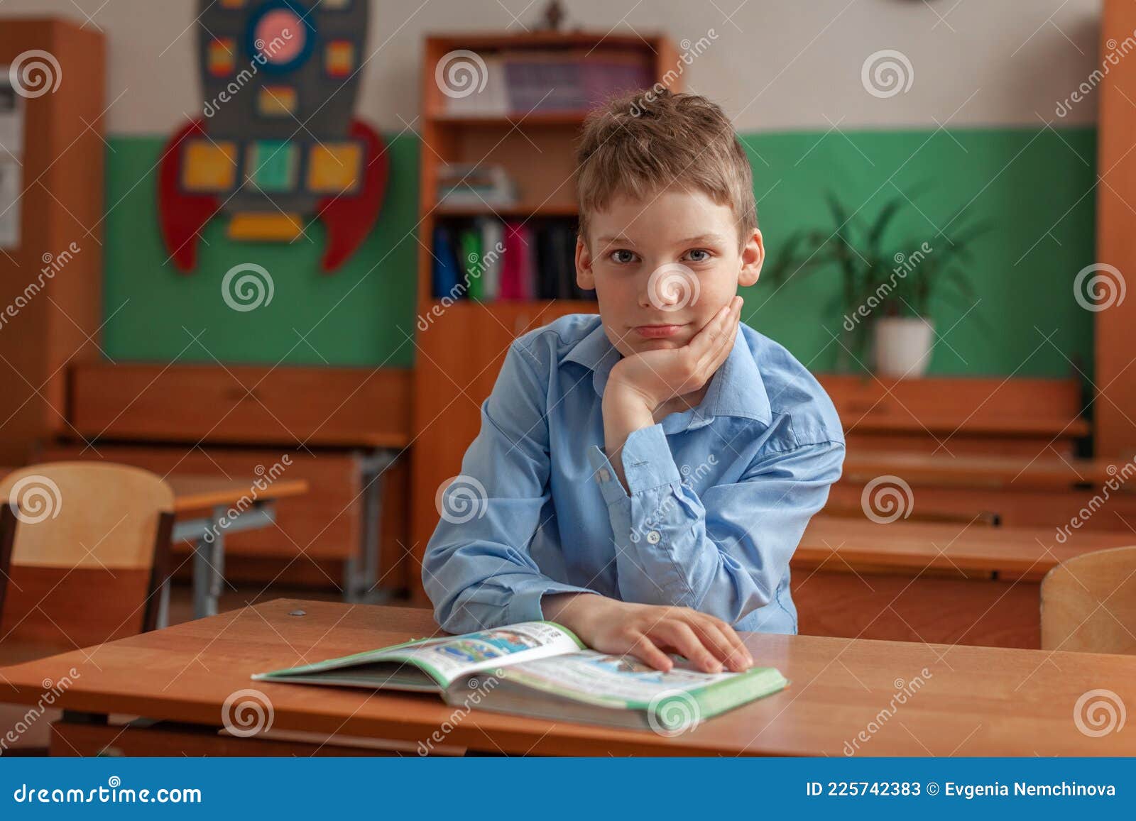 Primary School Boys Miling, Looking Camera in Blue Shirt, Sitting at ...