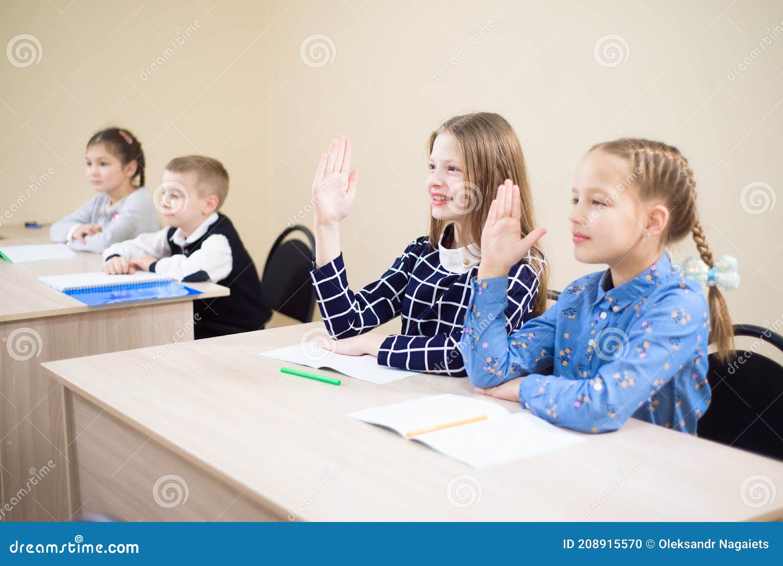 Primary School Children Work Together in Class. Stock Photo - Image of ...
