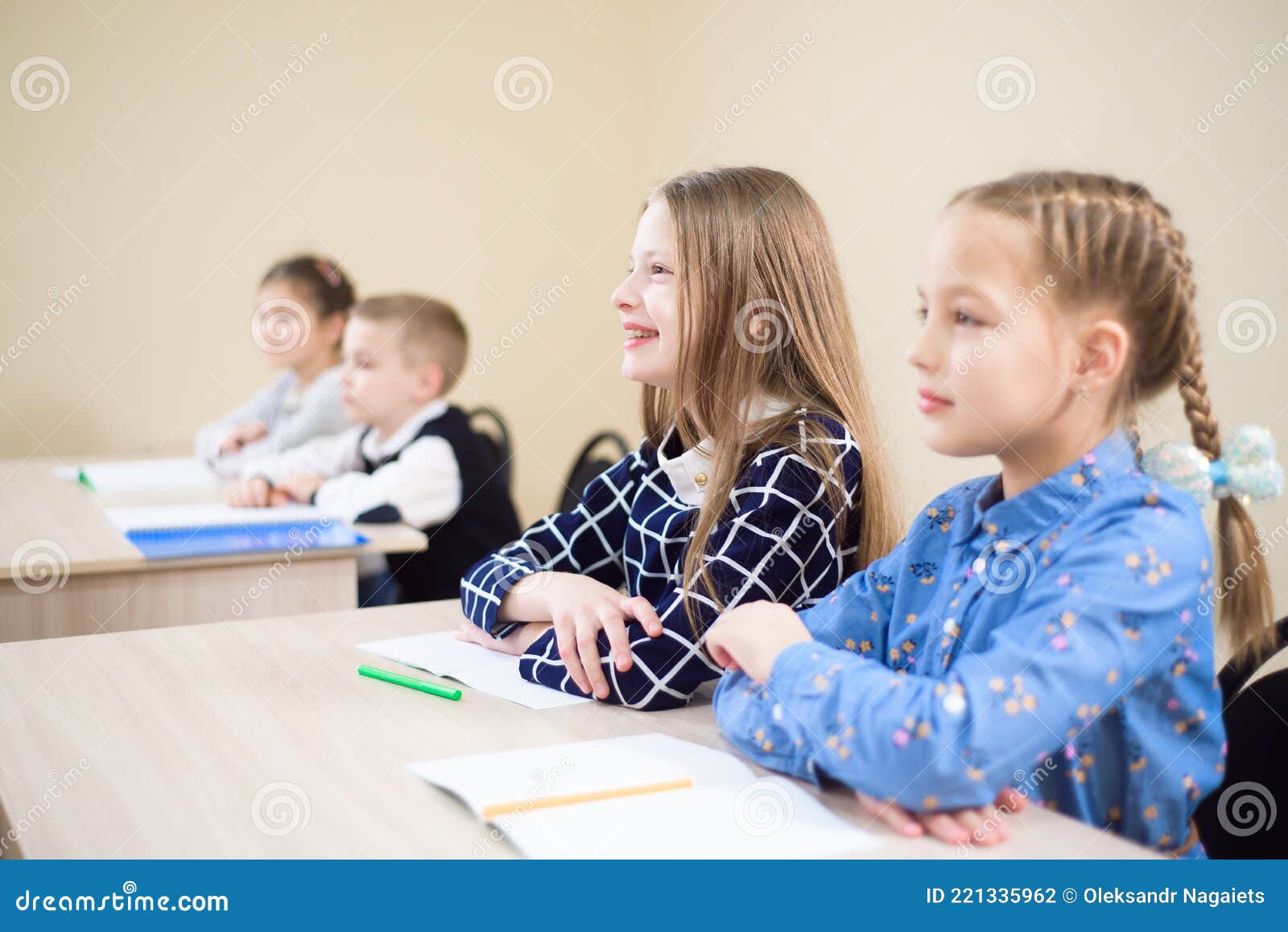 Primary School Children Work Together in Class. Stock Photo - Image of ...