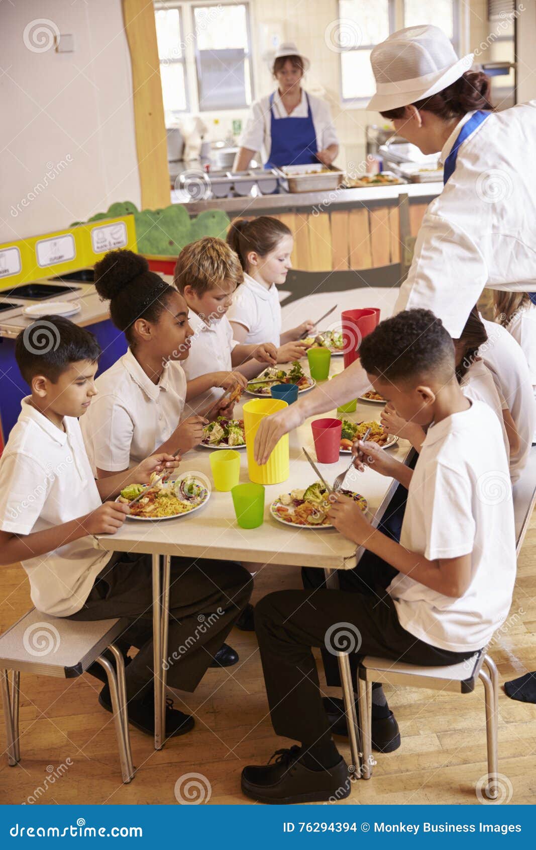Primary School Kids Eat Lunch in School Cafeteria, Vertical Stock Photo ...
