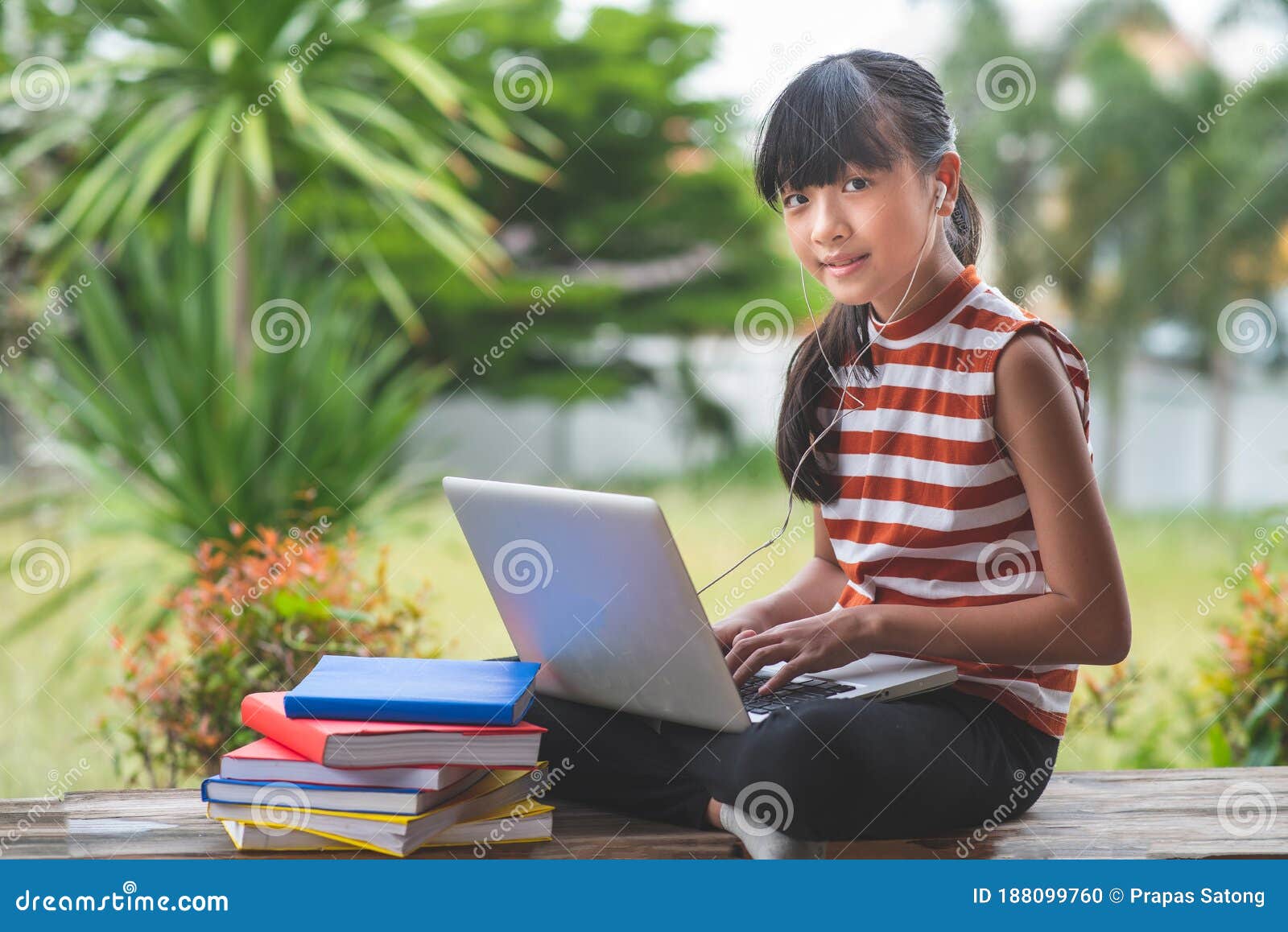 Primary School Students in Asia Sit and Study at a Distance from Home ...