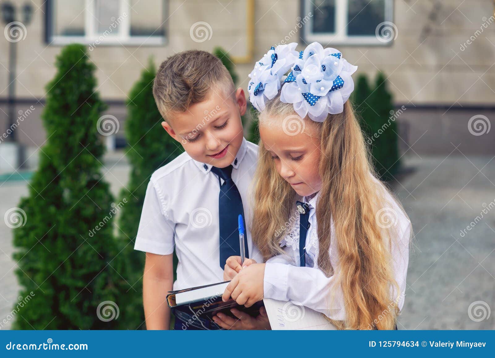 Primary School Students at Recess Doing Homework Stock Photo - Image of ...