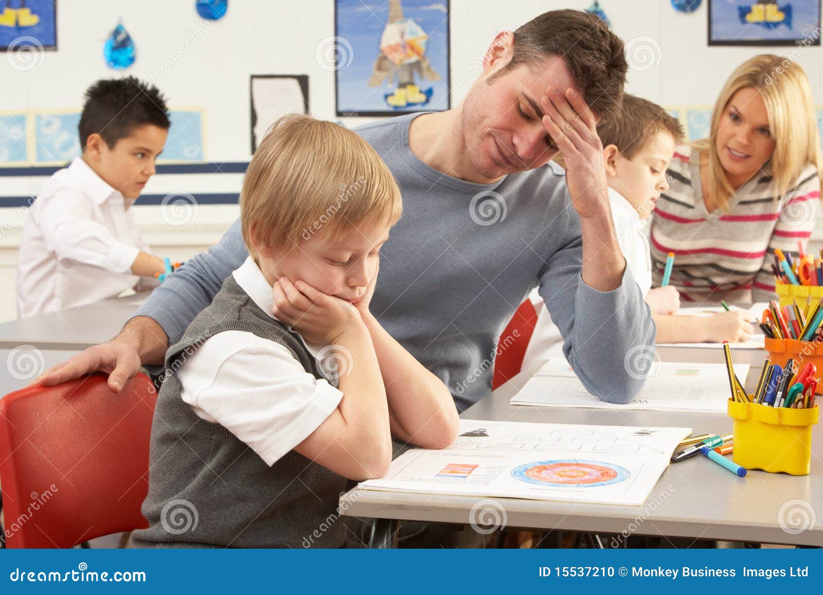 Primary Schoolchildren and Teacher Having a Lesson Stock Photo - Image ...