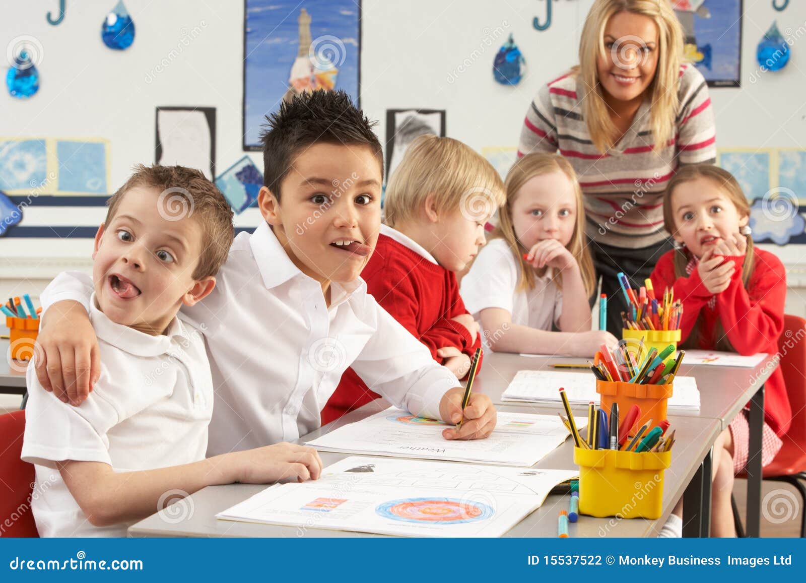 Primary Schoolchildren and Teacher Working Stock Photo - Image of grade ...