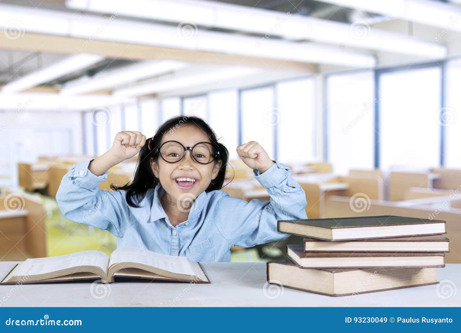 Primary Student Celebrating Her Success in Classroom Stock Image ...
