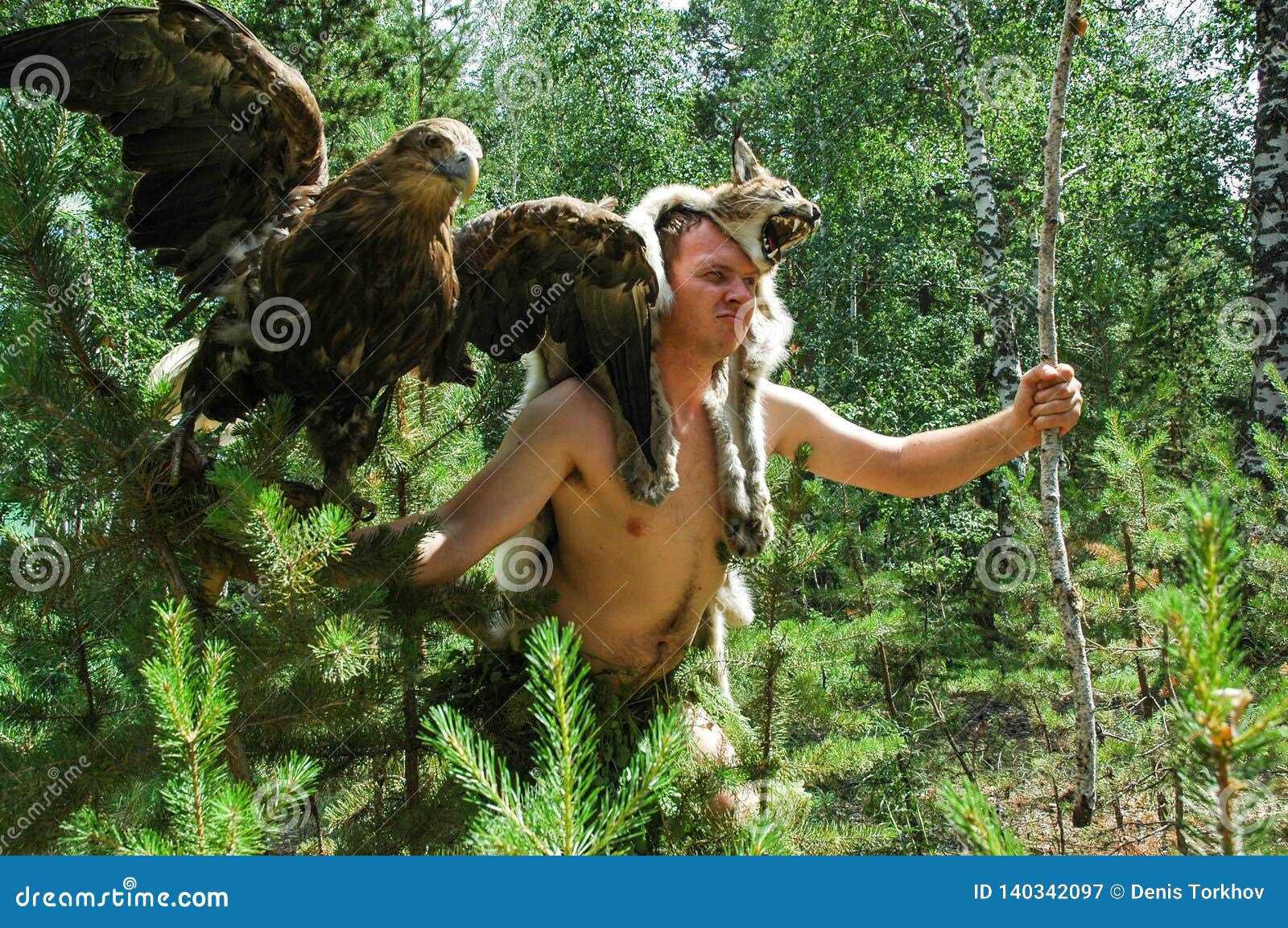 Primitive Man in the Forest Hunting with Sitting on the Arm of an Eagle ...