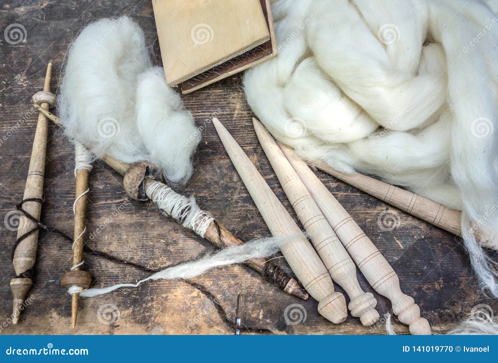 Primitive Spindles and White Sheep`s Wool Stock Photo - Image of beds ...