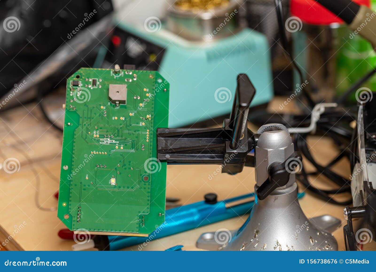 Printed Circuit Board in Vice on Workbench Stock Photo - Image of close ...