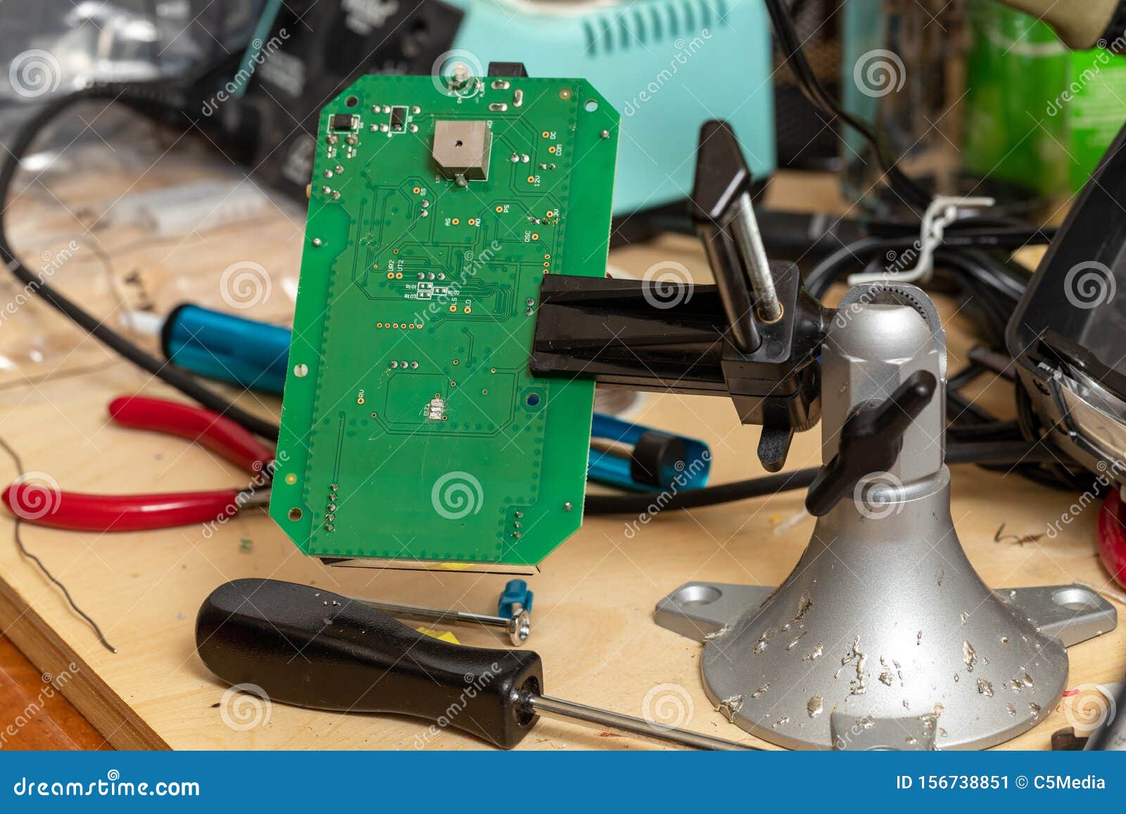 Printed Circuit Board in Vice on Workbench Stock Image - Image of board ...