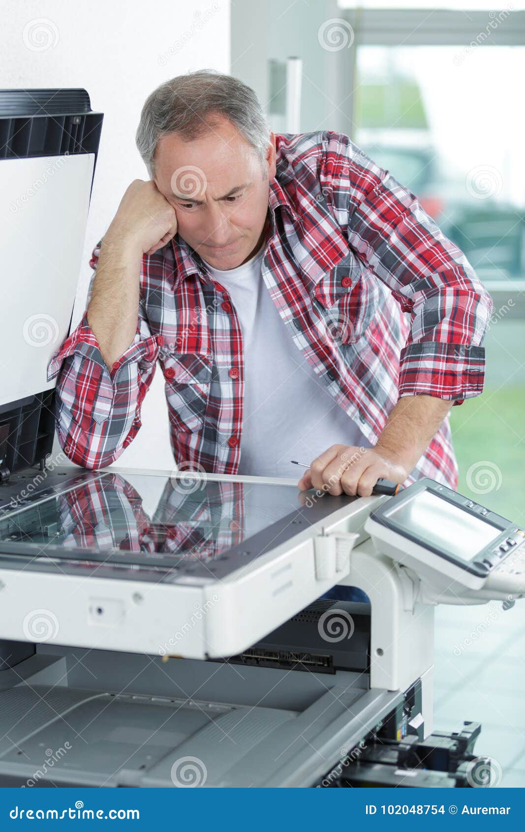 Printer Checking Print Run at Table Stock Photo - Image of cover ...
