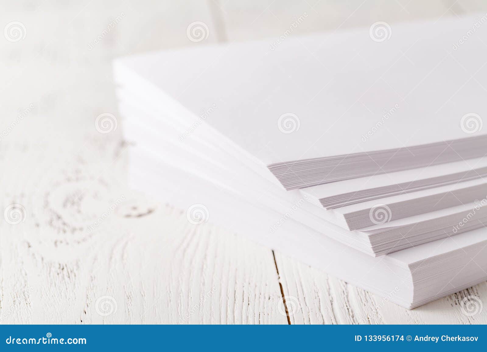 A4 printer paper on table stock photo. Image of organize - 133956174