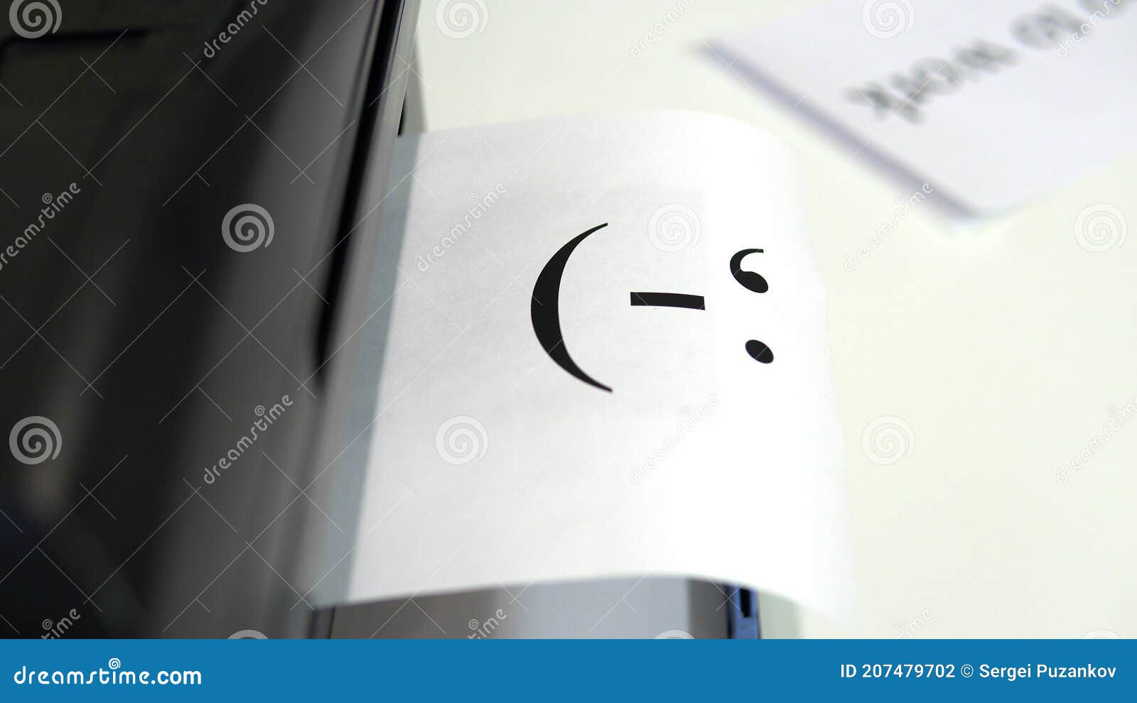 The Printer on the Table Printed a Winking Smiley Face on a Piece of ...