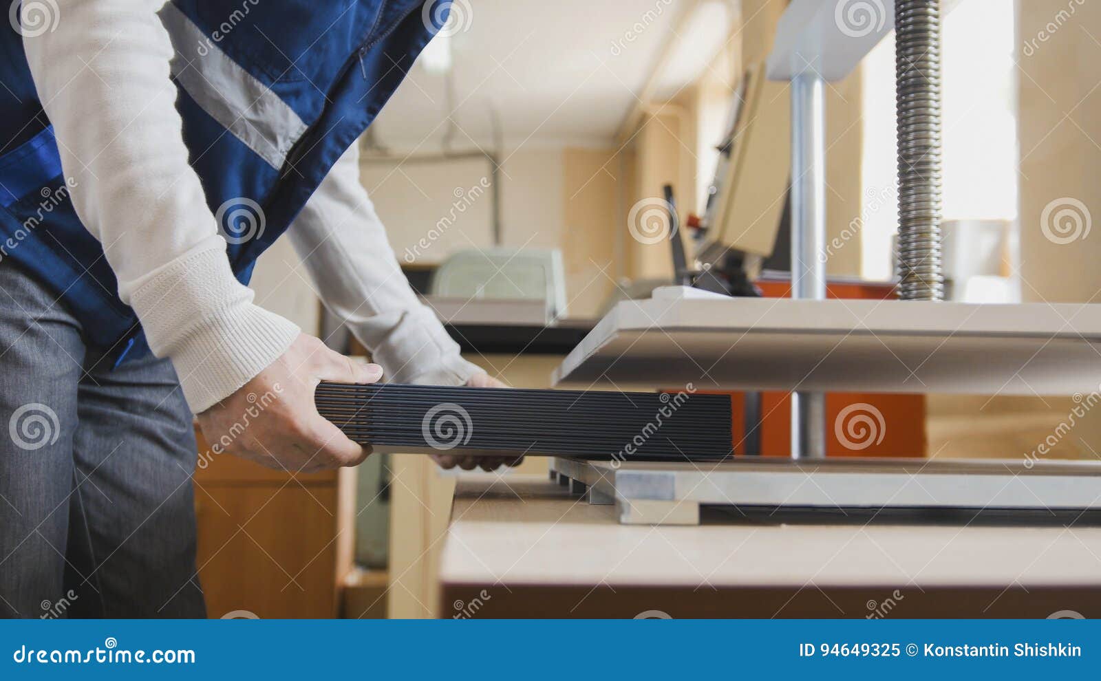Printing Process in Printing Press Machine - Worker Inserts Paper ...