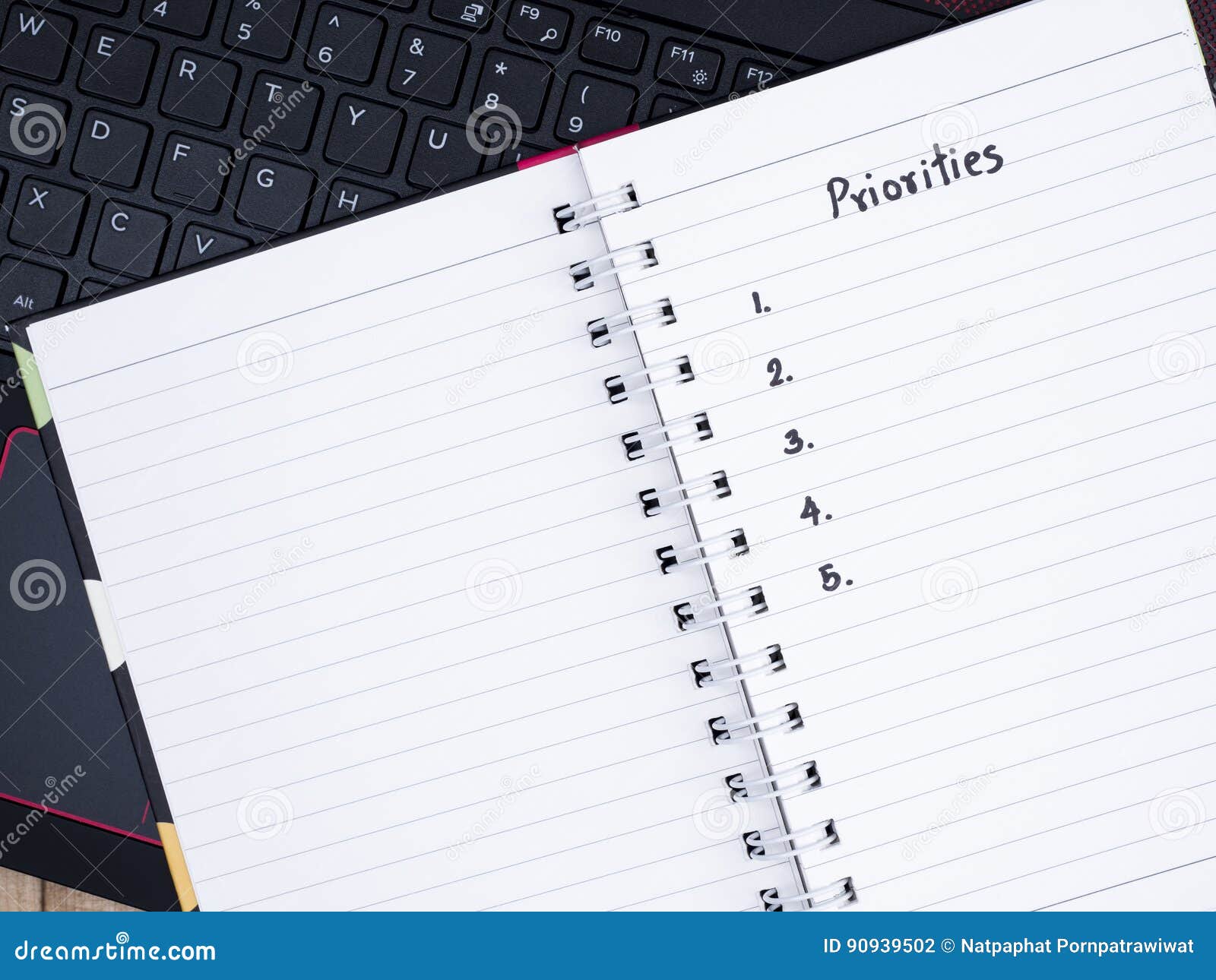 Priorities on Notebook with Laptop 1 Stock Photo - Image of object ...