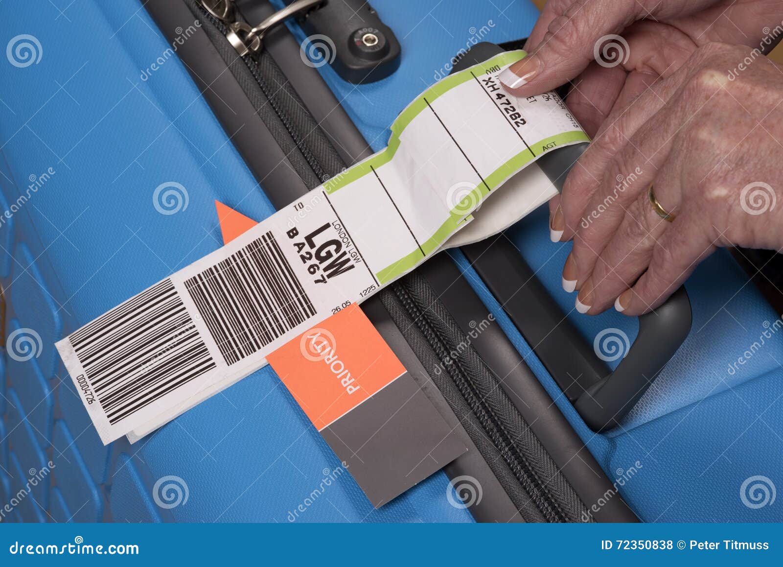 Priority Airline Security Tag on Suitcase Editorial Stock Photo - Image ...