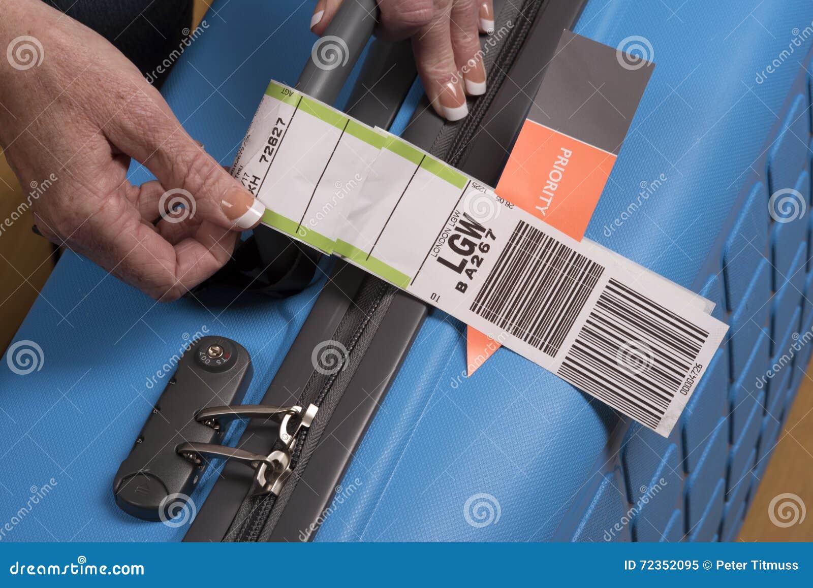 Priority Airline Security Tag on Suitcase Editorial Image - Image of ...