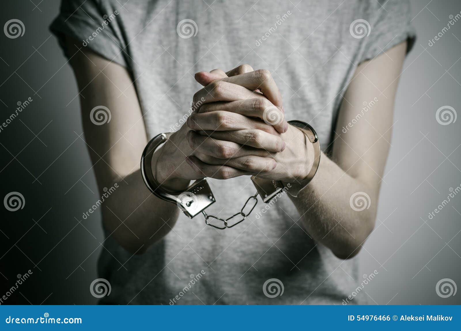 Prison And Convicted Topic: Man Hands With Handcuffs Isolated On White ... Prison And Convicted Topic: Man Hands With Handcuffs Isolated On White ...