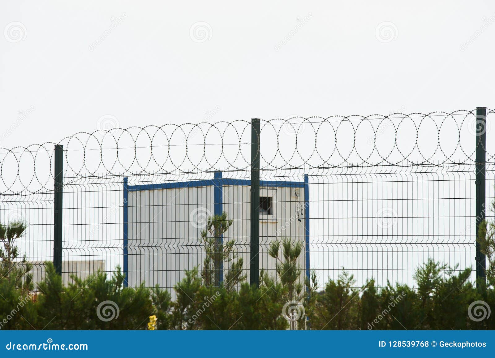 Prison Fence with Barbed Wire and Observation Booth Stock Photo - Image ...