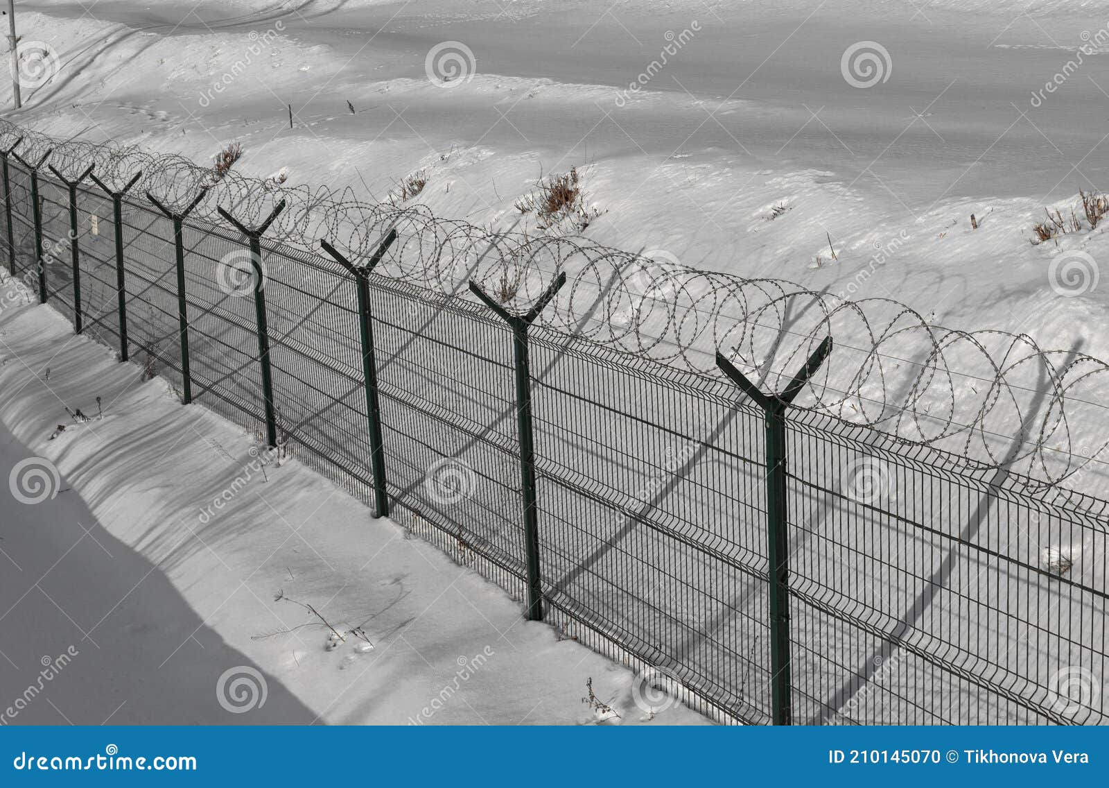 Prison Fence in Winter Time Stock Photo - Image of freedom, control ...