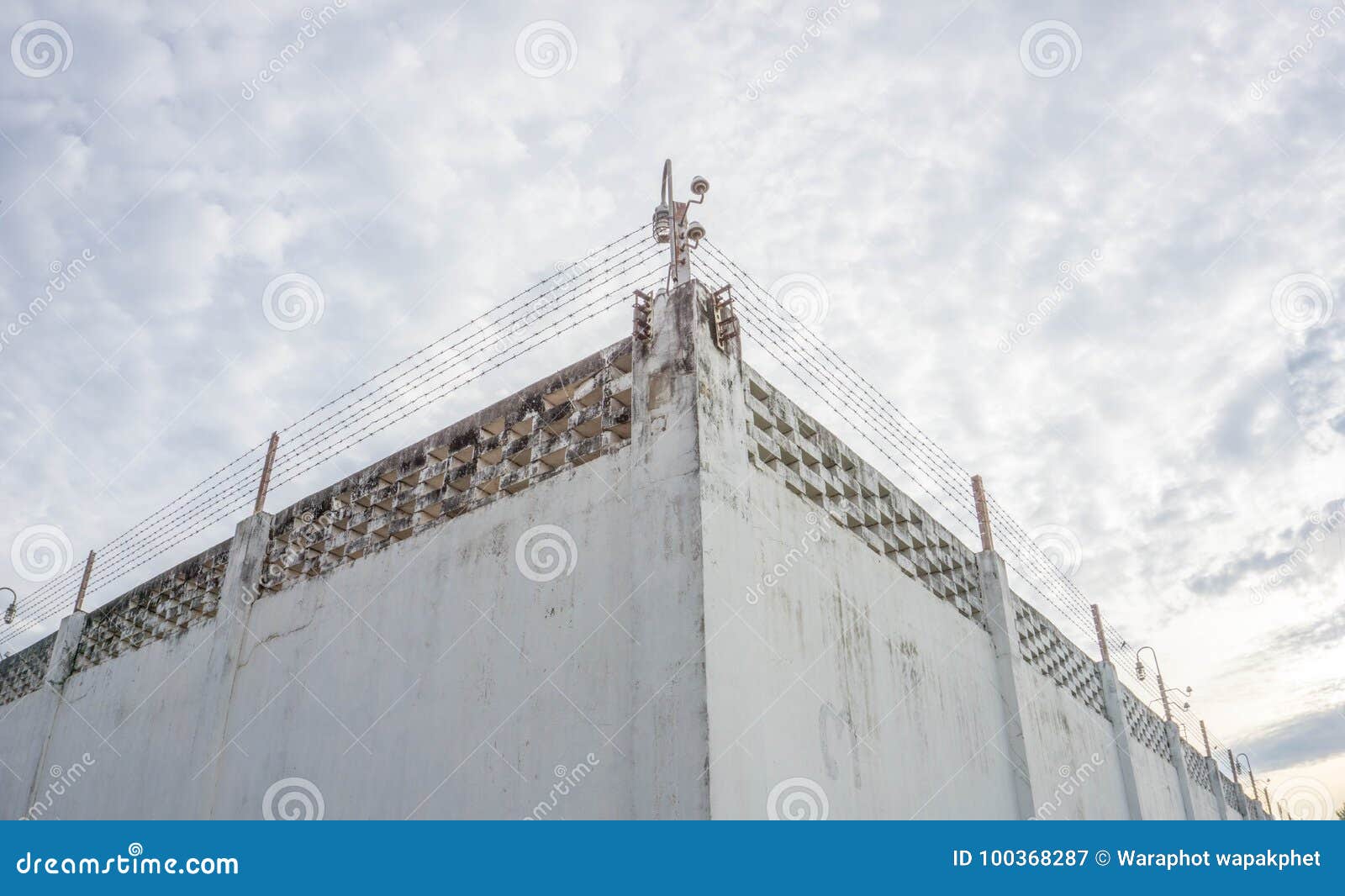 Prison wall sky background editorial photography. Image of blue - 100368287