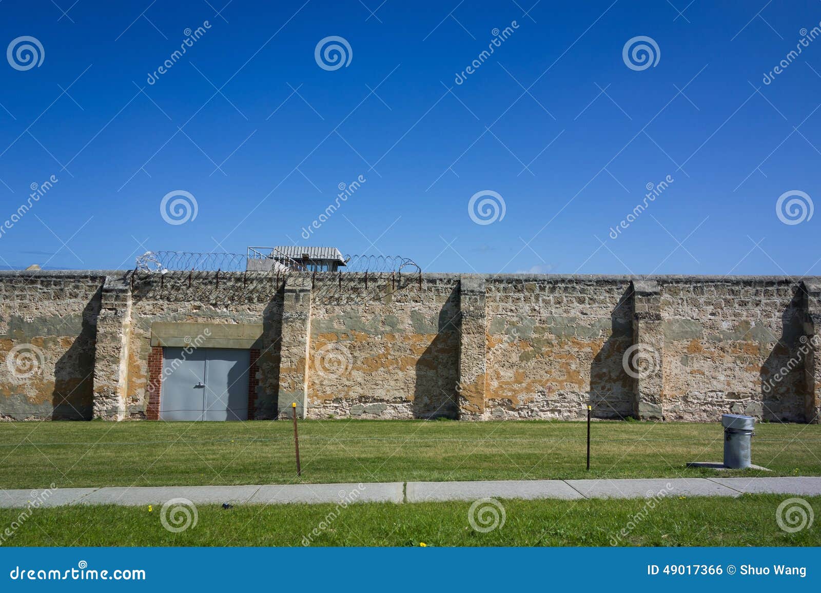 Prison Wall stock photo. Image of barbed, jail, grass - 49017366