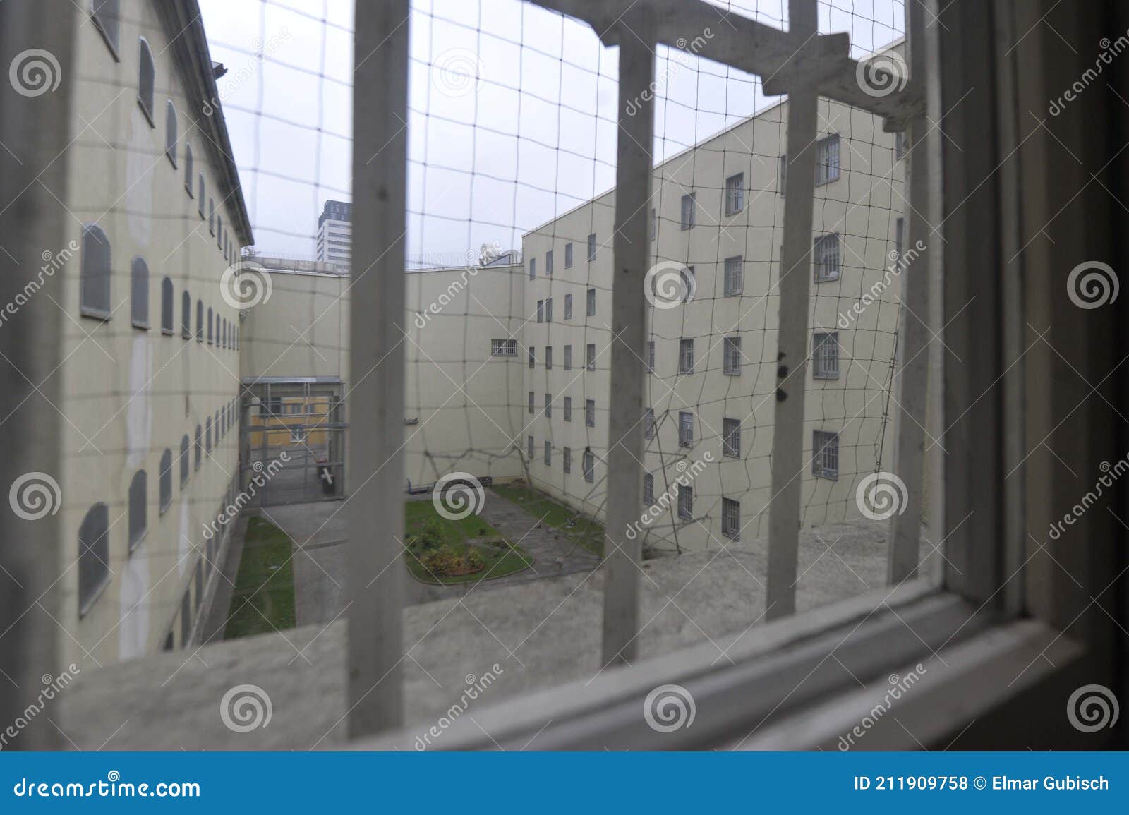 Prison window with bars stock photo. Image of legal - 211909758