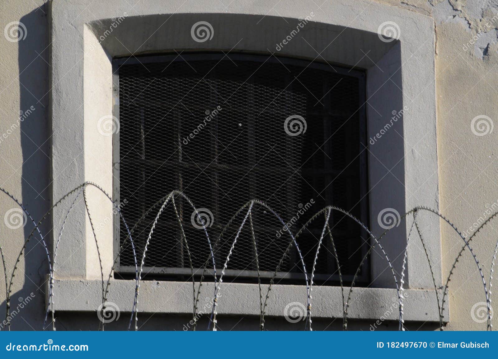 Prison Window and Razor Wire Stock Photo - Image of authority, wall ...