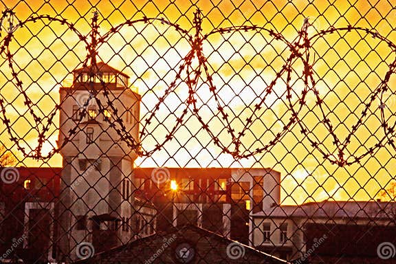 Prison yard stock image. Image of light, fence, sunrise - 6837675