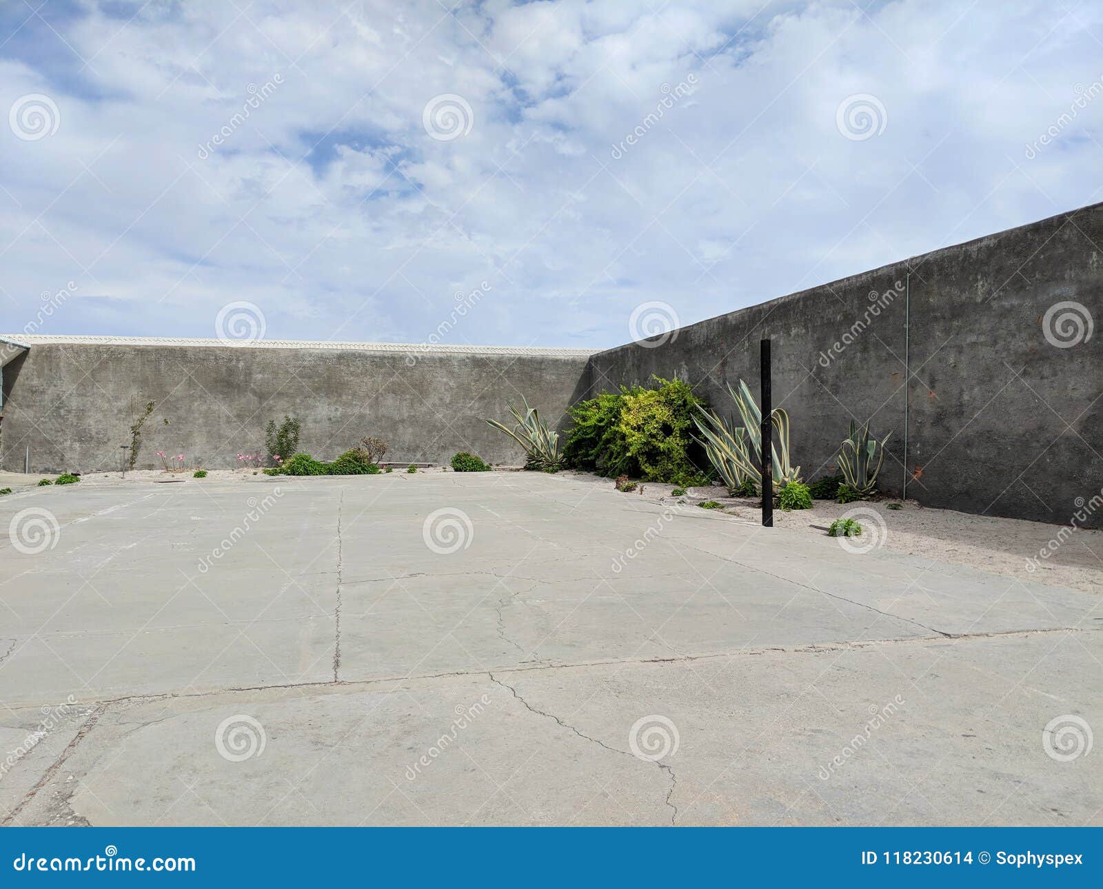 Prison Yard, Cloud Sky and Wall Stock Photo - Image of south, prison ...