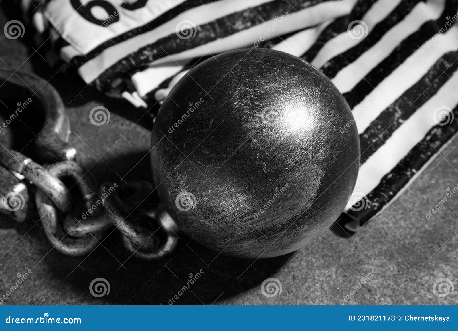 Prisoner Ball with Chain on Grey Table, Closeup Stock Image - Image of ... Prisoner Ball with Chain on Grey Table, Closeup Stock Image - Image of ...