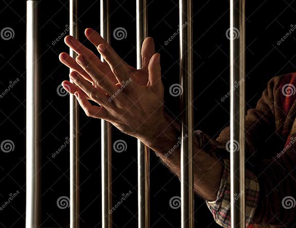 Prisoner behind bars stock photo. Image of mercy, charity - 28252300