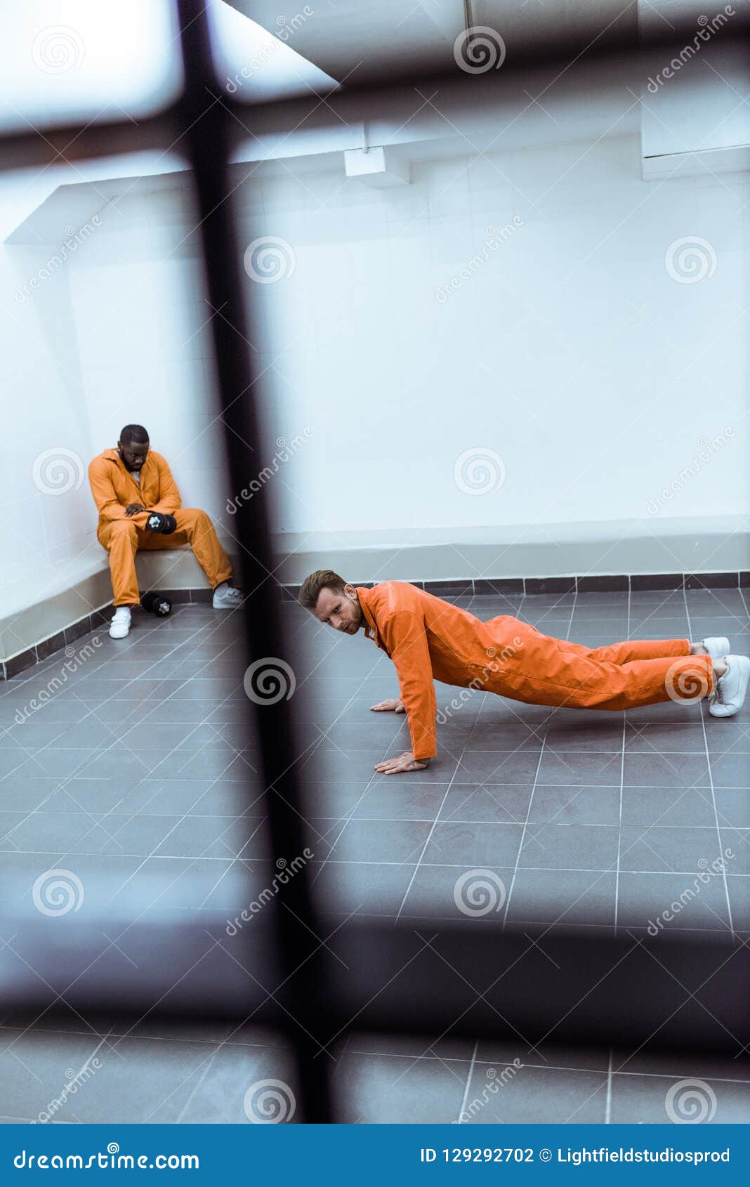 Prisoner doing push-ups stock photo. Image of inmates - 129292702