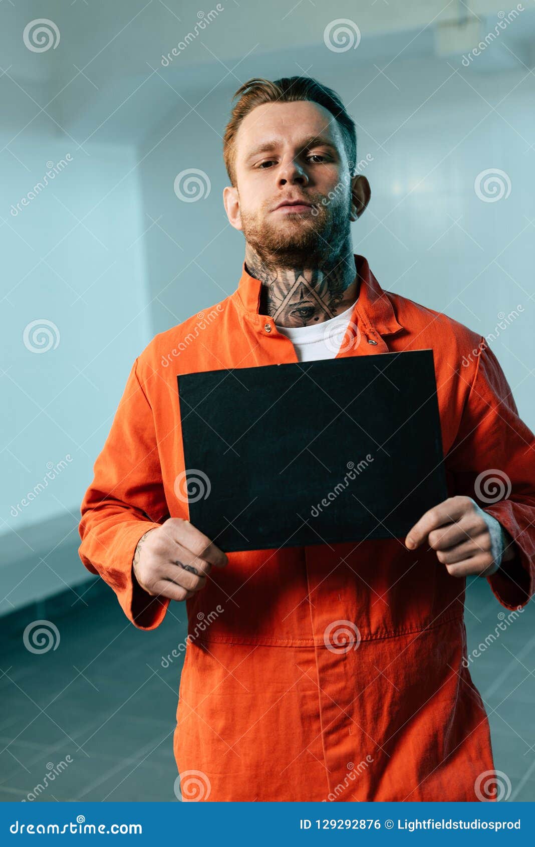 Prisoner Holding Stop Prison Overcrowding Sign In Cell, Life Conditions ...