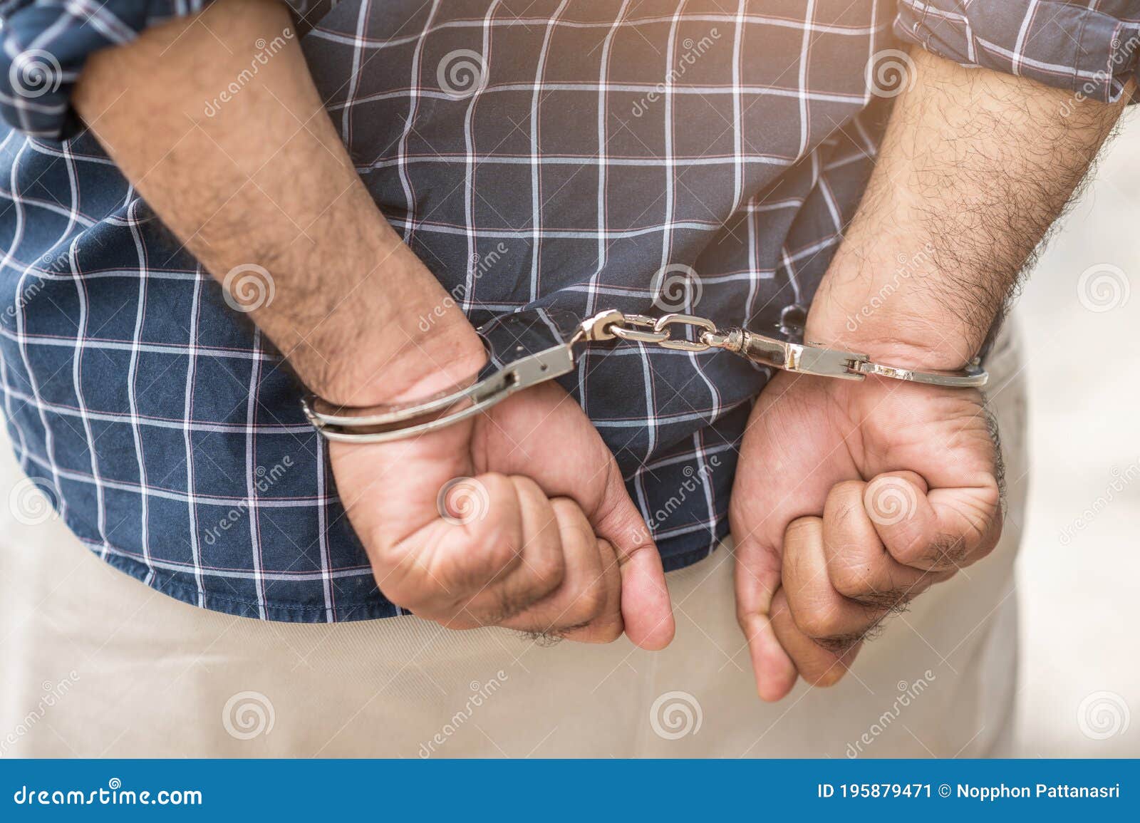 Prisoner Man in Jail with Handcuffs. Close Up Shackled in Hands Stock ...