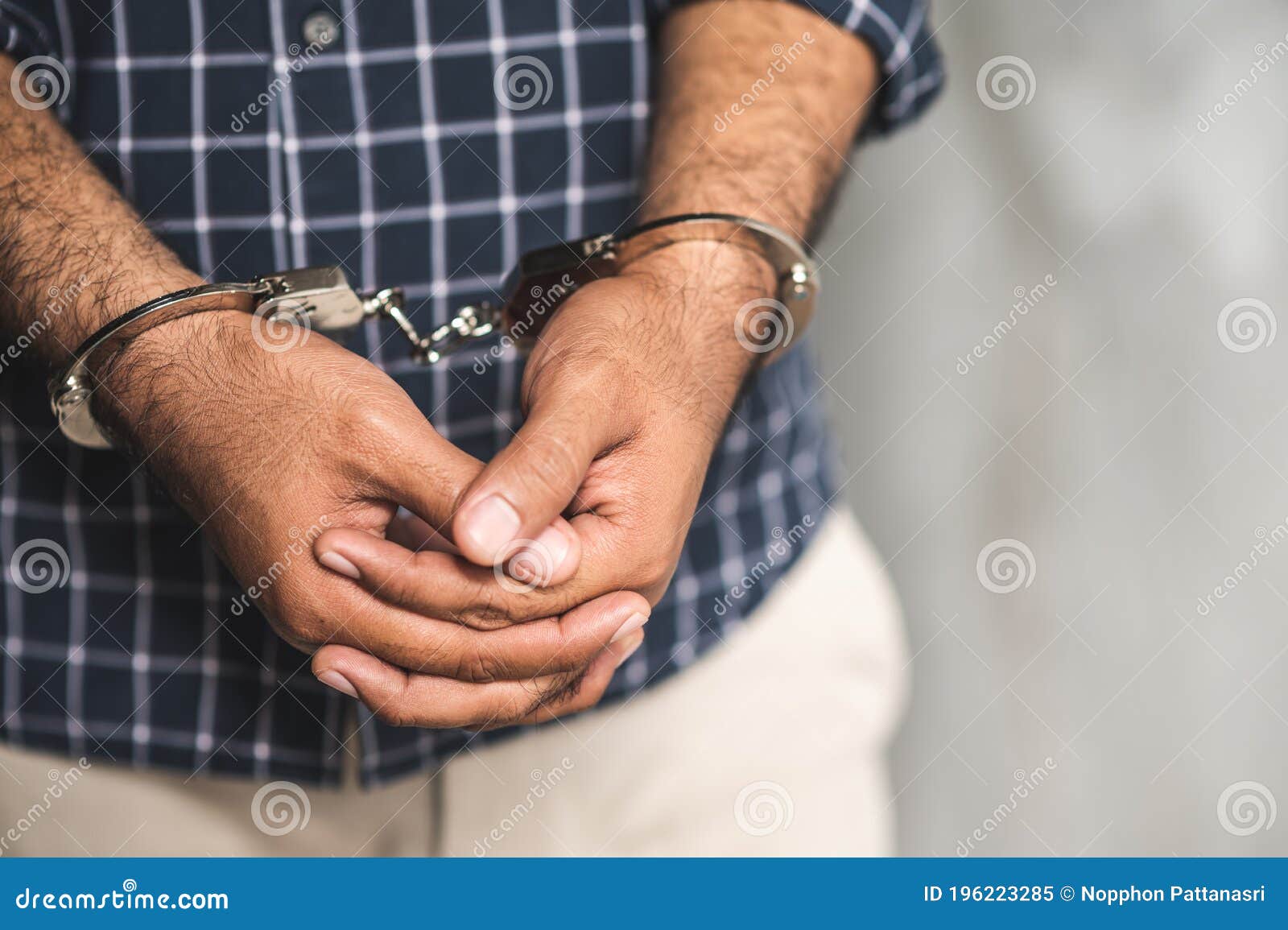 Prisoner Man in Jail with Handcuffs. Close Up Shackled in Hands Stock ...