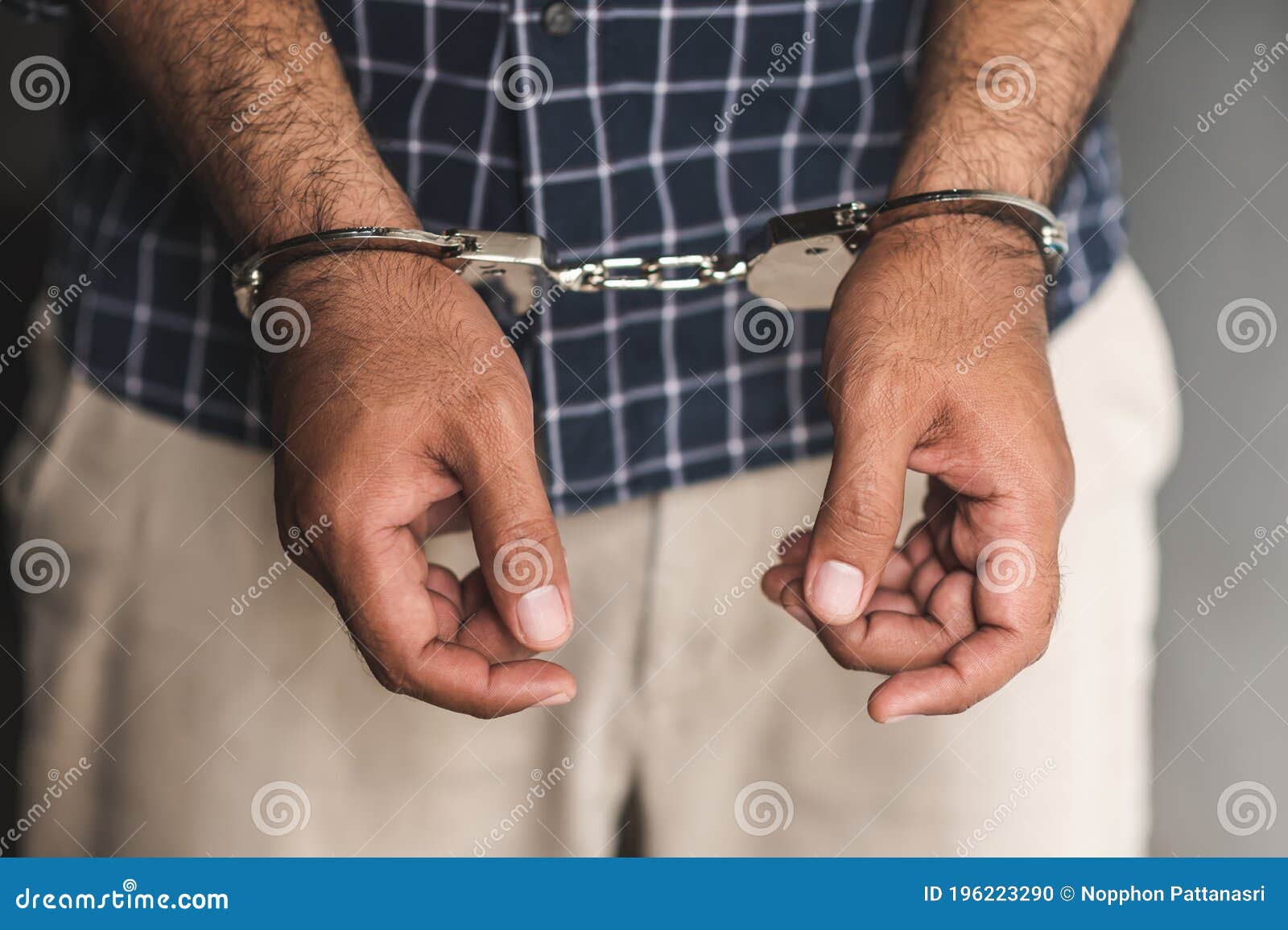 Prisoner Man in Jail with Handcuffs. Close Up Shackled in Hands Stock ...