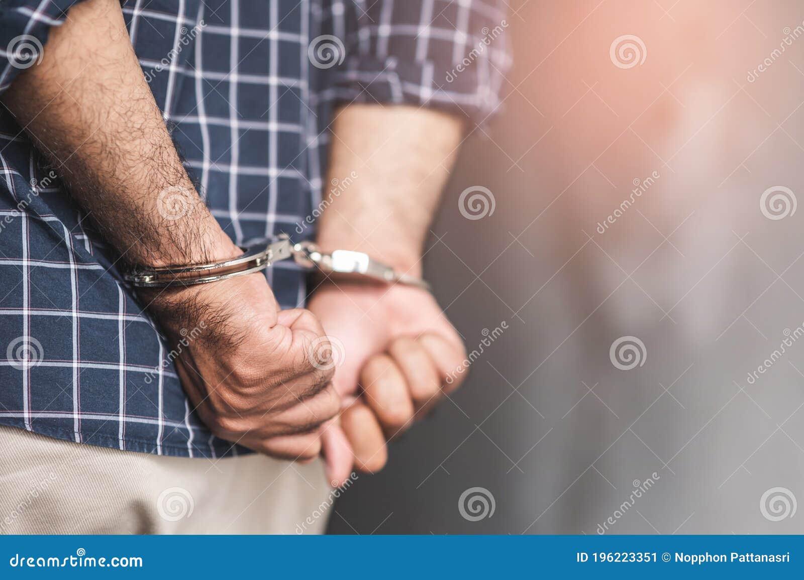 Prisoner Man in Jail with Handcuffs. Close Up Shackled in Hands Stock ...