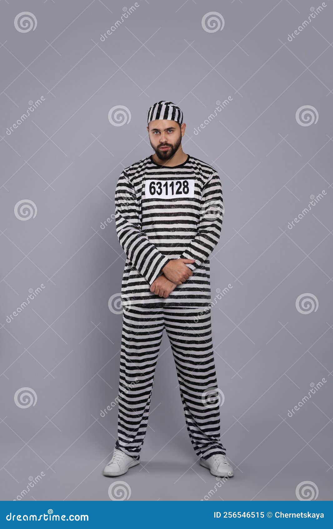 Prisoner in Special Uniform on Grey Background Stock Image - Image of ...