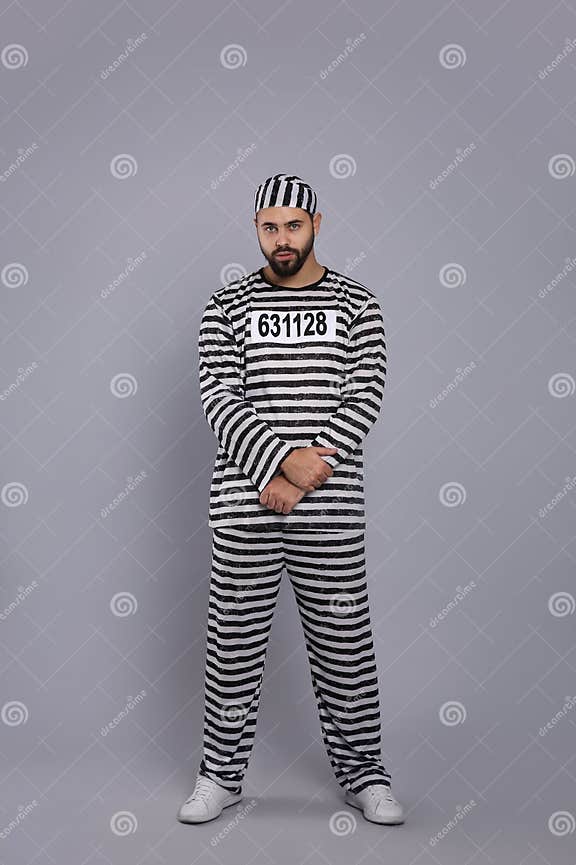 Prisoner in Special Uniform on Grey Background Stock Image - Image of ...