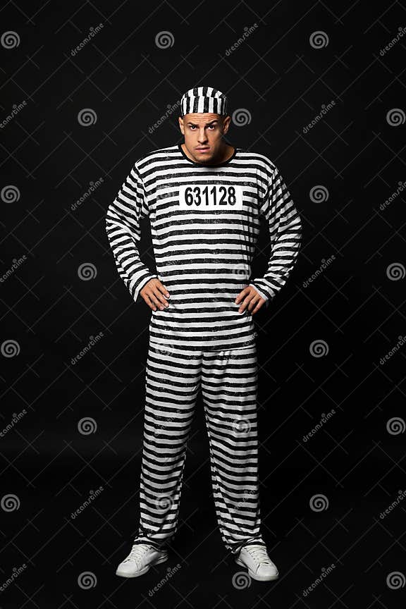 Prisoner in Striped Uniform on Black Background Stock Image - Image of ...