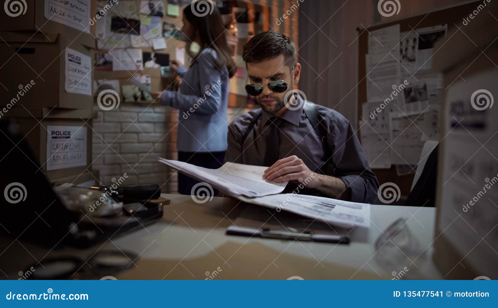 Private Detective Reading Papers of Criminal Case, Systematizing ...