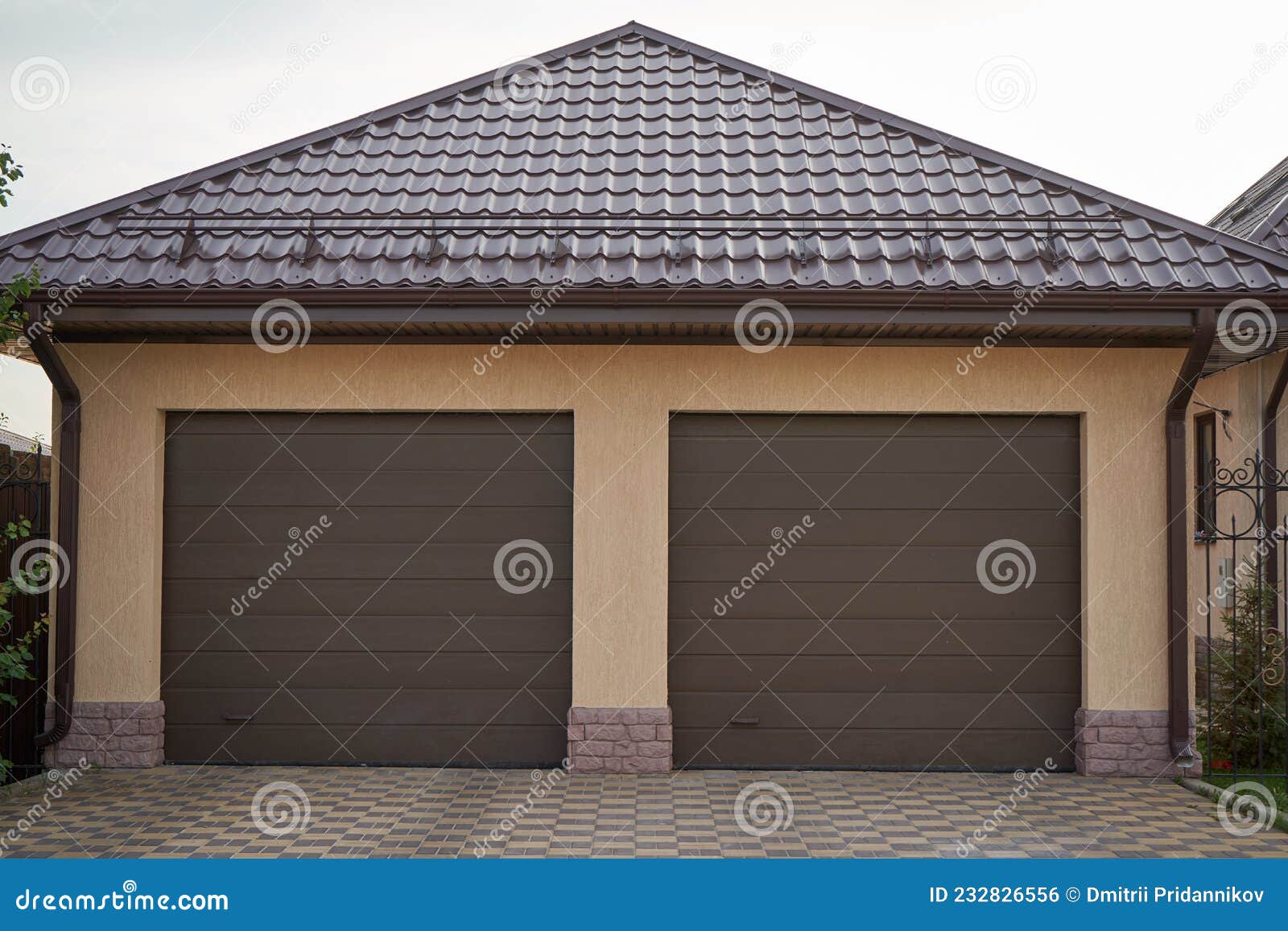 Private Garage with Rolling Gates for Two Cars Stock Photo - Image of ...
