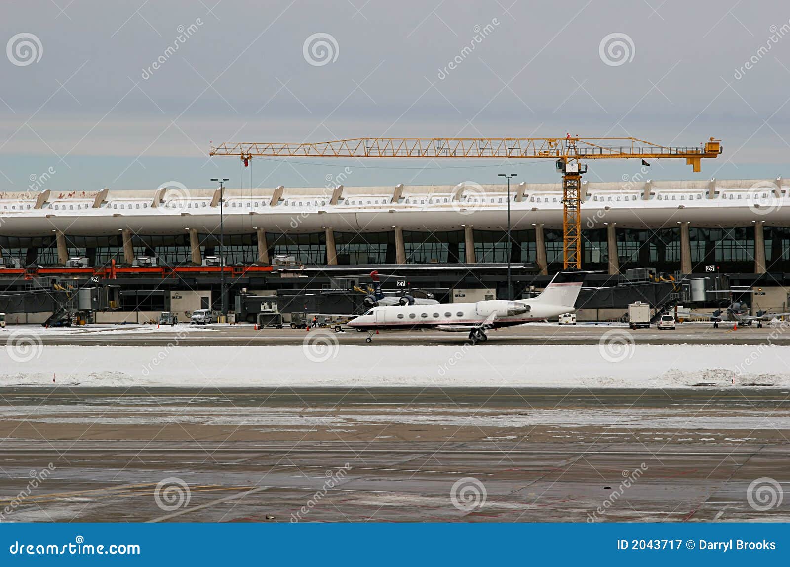 Private Jet and Crane stock image. Image of season, landing - 2043717